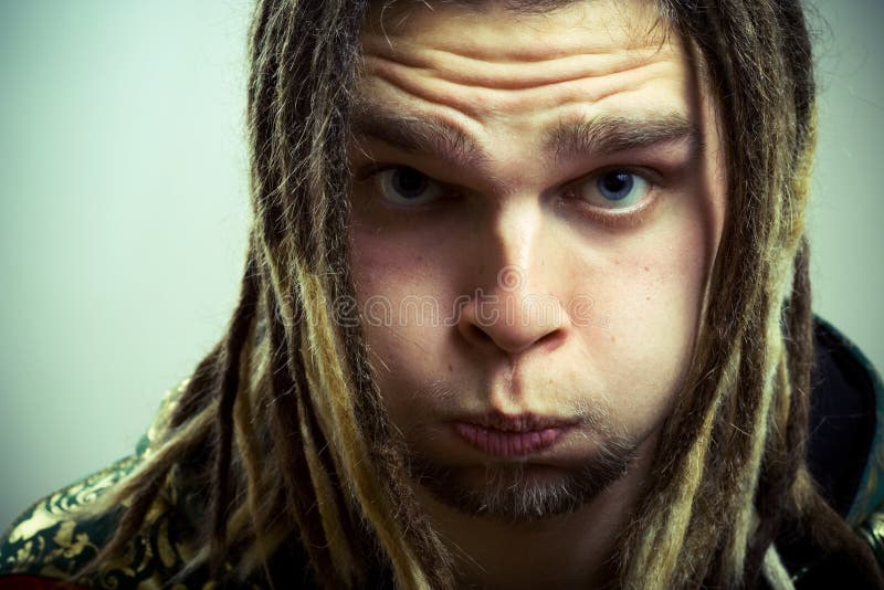 Rastaman blowing cheeks. stock photo. Image of expressing - 6924132