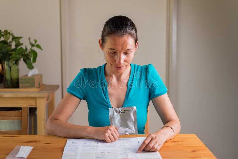 RAT Test at Home. Step 1. Read Instructions. Stock Photo - Image of ...