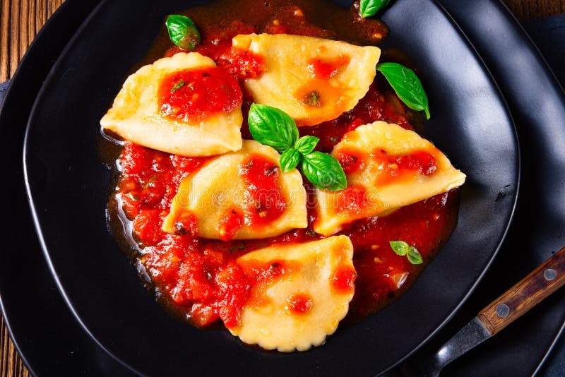 Ravioli Alla Genovese with Basil Tomato Sauce Stock Image - Image of ...