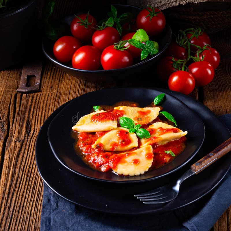 Ravioli Alla Genovese with Basil Tomato Sauce Stock Image - Image of ...