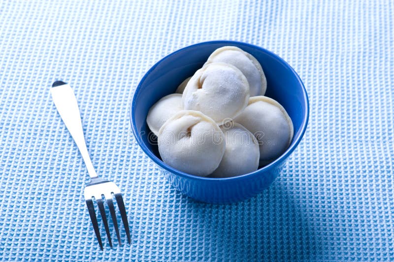 Ravioli on blue close up stock photo. Image of lunch - 20352150