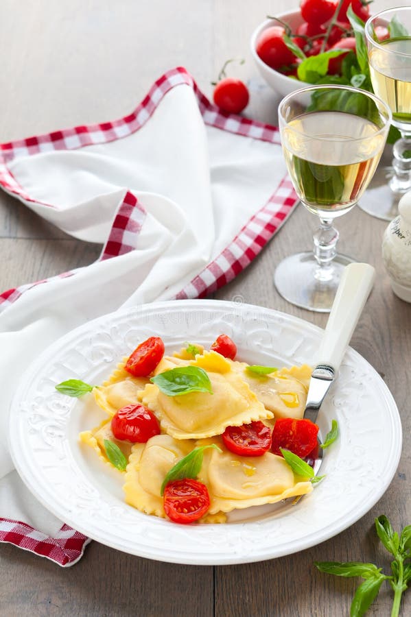 Ravioli with Tomatoes and Basil Stock Photo - Image of basil, kitchen ...