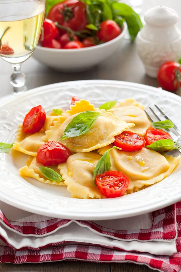 Ravioli with Tomatoes and Basil Stock Photo - Image of basil, kitchen ...