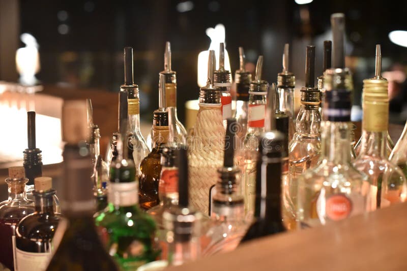 Raw of Alcohol Bottles in the Bar Table Close Up Stock Photo - Image of ...
