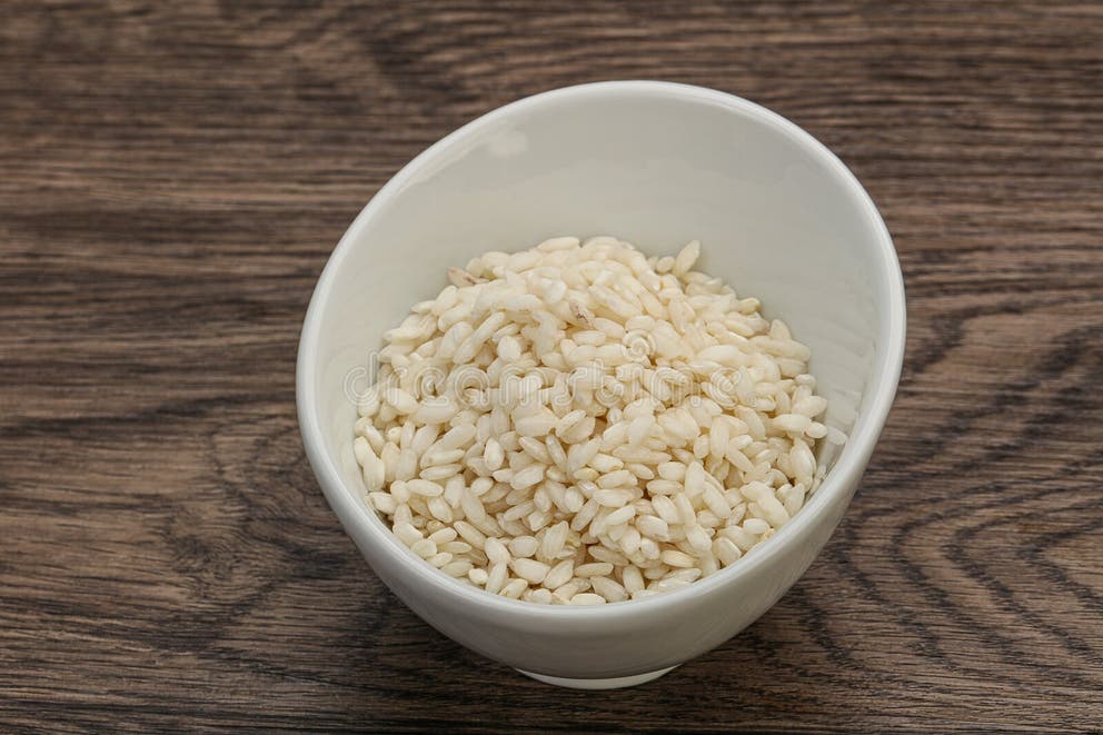 Raw Arborio Rice for Risotto Stock Photo - Image of closeup, background ...
