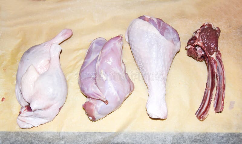 Raw Assorted Meat Rabbit Mutton Turkey Duck Pork Cooked on a Pap Stock ...