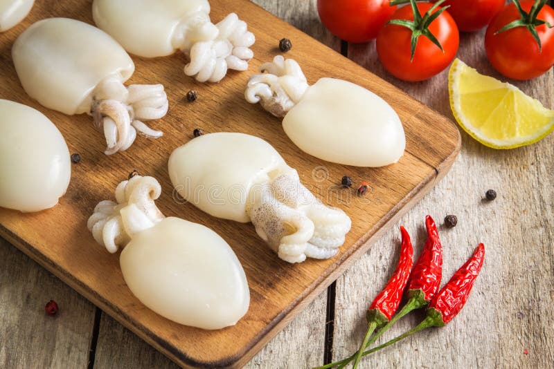 Raw Babies Cuttlefish on Rustic Background Stock Image - Image of meat ...