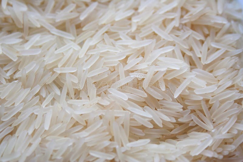 Raw basmati rice granules stock image. Image of grocery - 144063061