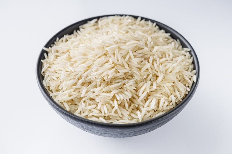 Raw Basmati Rice on a White Acrylic Background Stock Photo - Image of ...