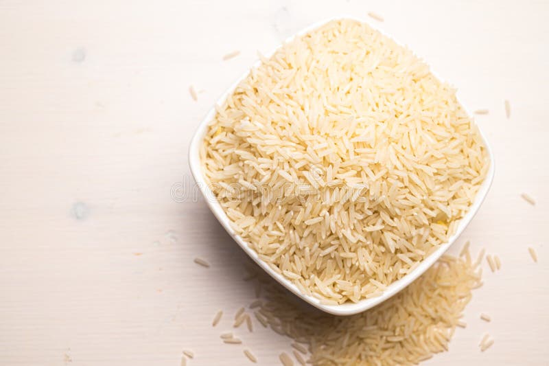 Raw Basmati Rice, in White Bowl Stock Photo - Image of risotto, basmati ...
