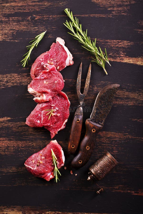 Raw Beaf on a Dark Wooden Table Stock Photo - Image of market, meal ...