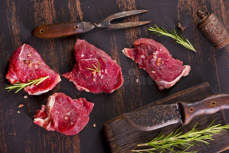 Raw Beaf on a Dark Wooden Table Stock Image - Image of grill, nuts ...