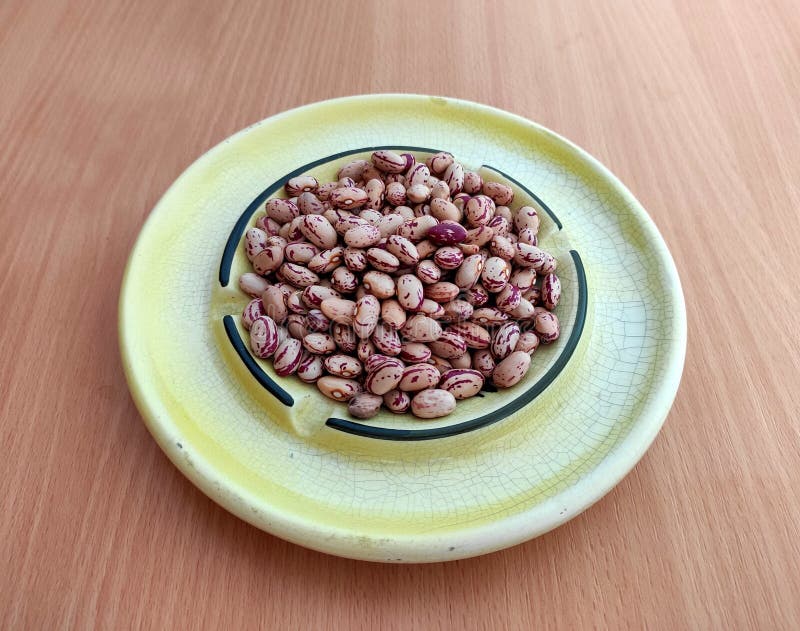 Raw beans on the table stock photo. Image of summer - 348684726