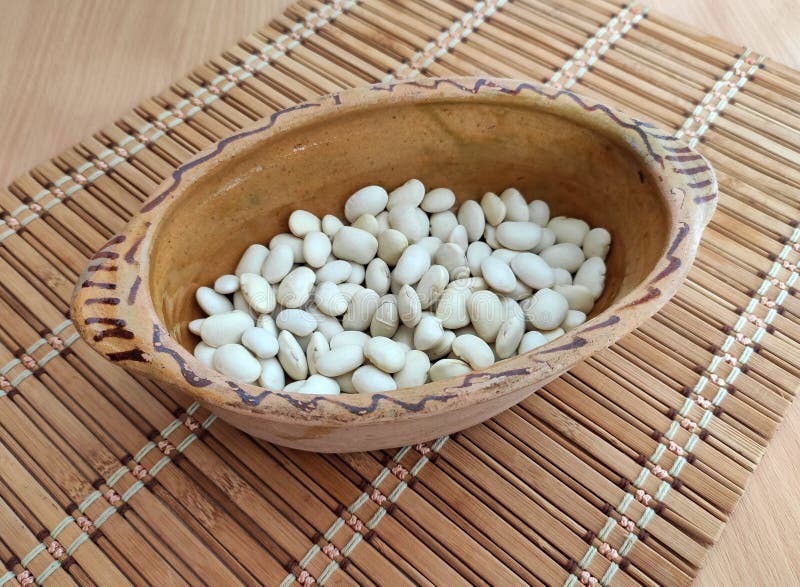 Raw beans on the table stock image. Image of garden - 348685321