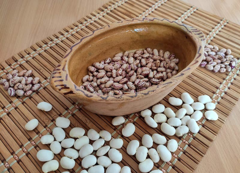 Raw beans on the table stock image. Image of garden - 348685311