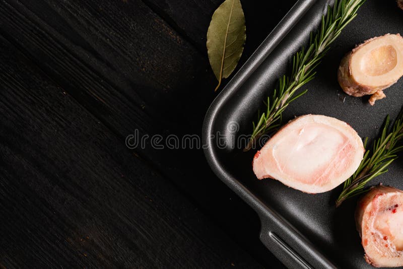 Raw Beef Bones for Making Broth at Home, on Black Wooden Table ...