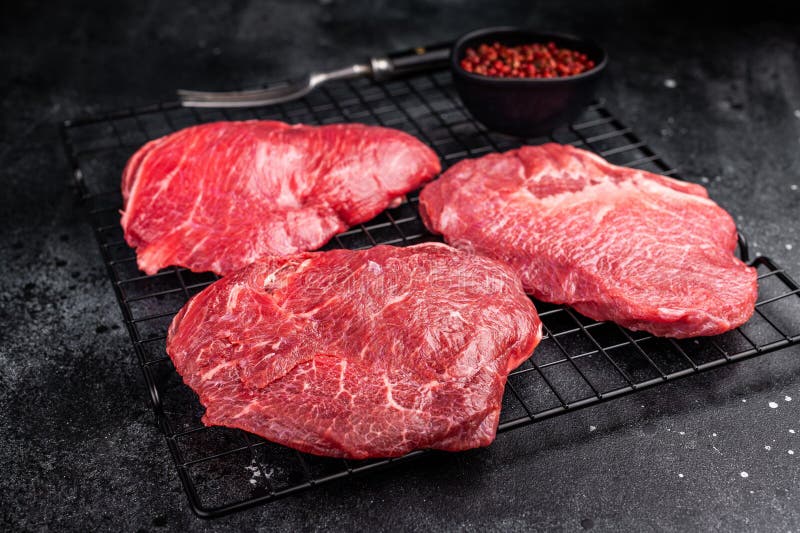 Raw Beef Cheeks, Fresh Veal Meat. Black Background Stock Photo - Image ...