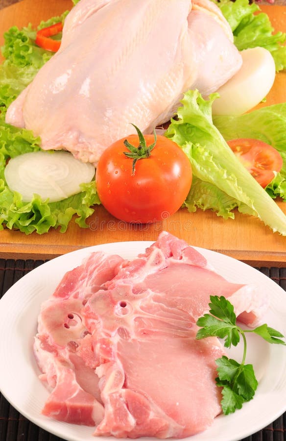Raw beef and chicken stock image. Image of onion, bone - 12230819