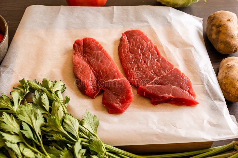 Raw Beef Chops Closeup in the Kitchen Stock Image - Image of garlic ...