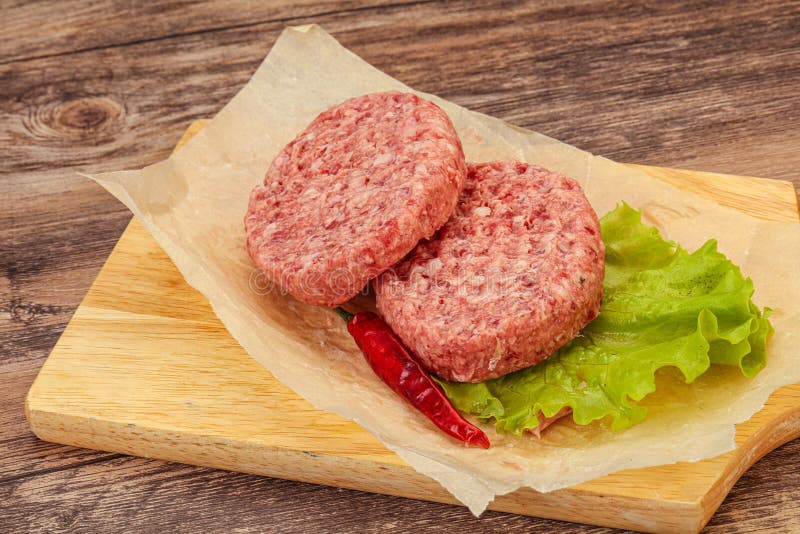Raw beef cutlet for burger stock image. Image of space - 195317387