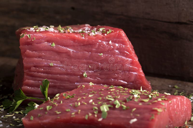 Raw beef fillet stock image. Image of slice, herbs, cutting - 67571257