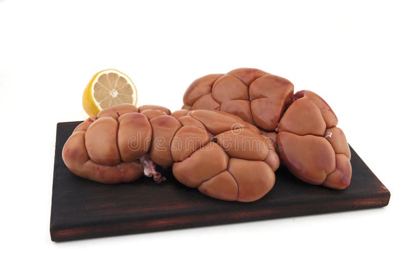 Raw Beef Kidney on a Cutting Board Isolated on a Light Background ...