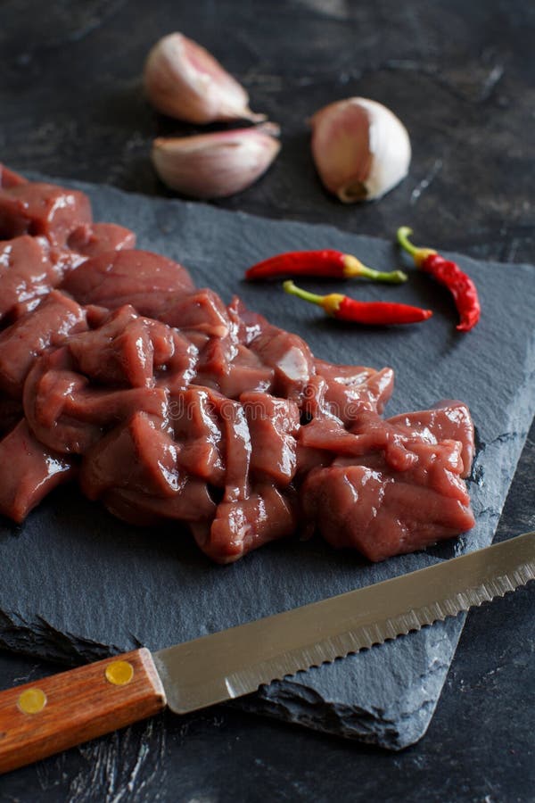 Raw Beef Liver with Spices, Herbs and Vegetables Stock Photo - Image of ...