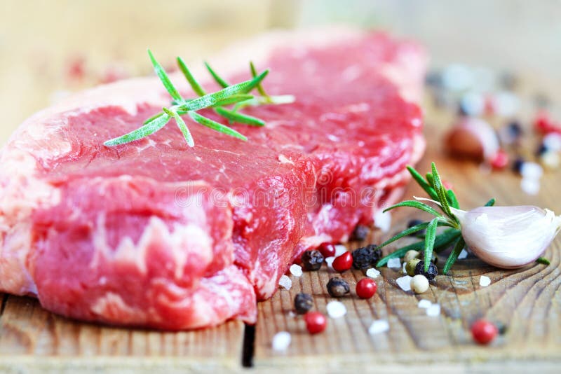 Raw Roast Beef with Herbs Tied with a Rope with Cooking Ingredients ...