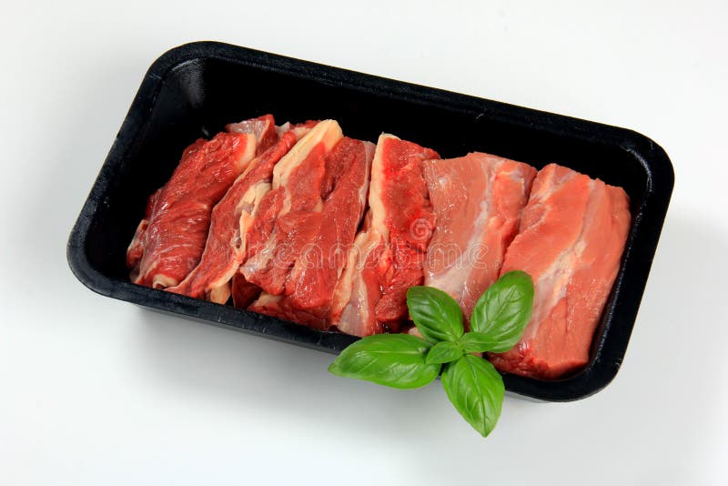 Raw Beef Meat in a Black Plastic Container. Stock Photo - Image of ...