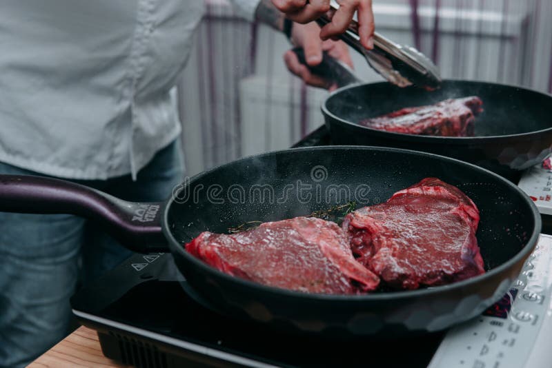 Gourmet Beef Steak with Elegant Garnish in Fine Dining Setting Stock ...