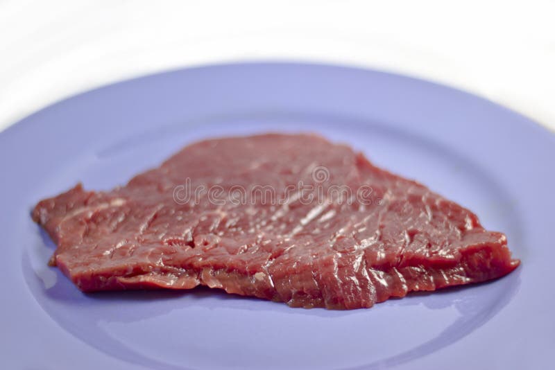 Raw Beef Meat in a Purple Plate Stock Image - Image of beef, plate ...