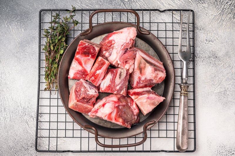 Raw Beef Meat and Veal Bones for Stew or Goulash. Grey Background Stock ...