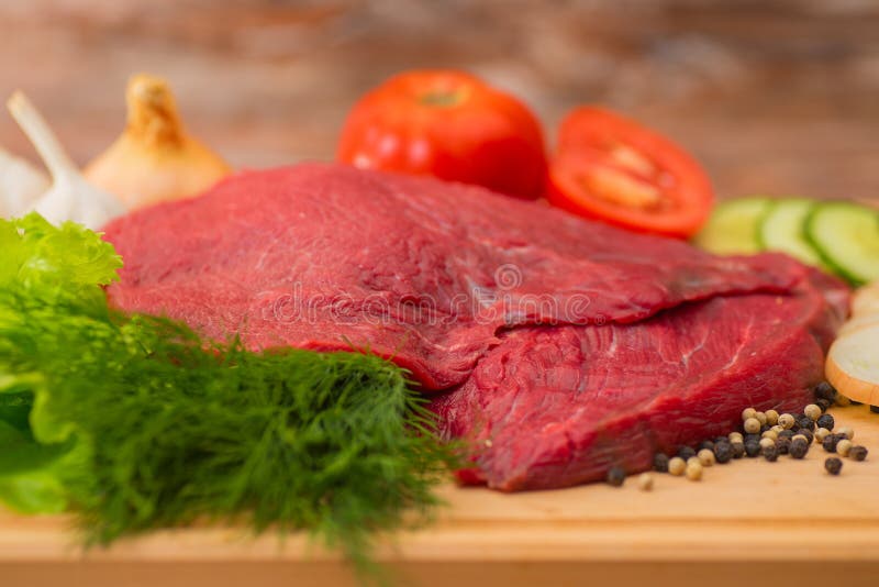 Raw Beef Meat with Vegetables on Wooden Plate Stock Image - Image of ...