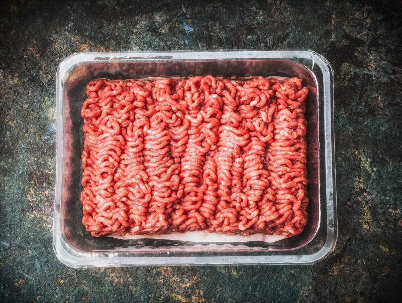 Raw Beef Minced Meat in Plastic Box on Rustic Background, Top View ...