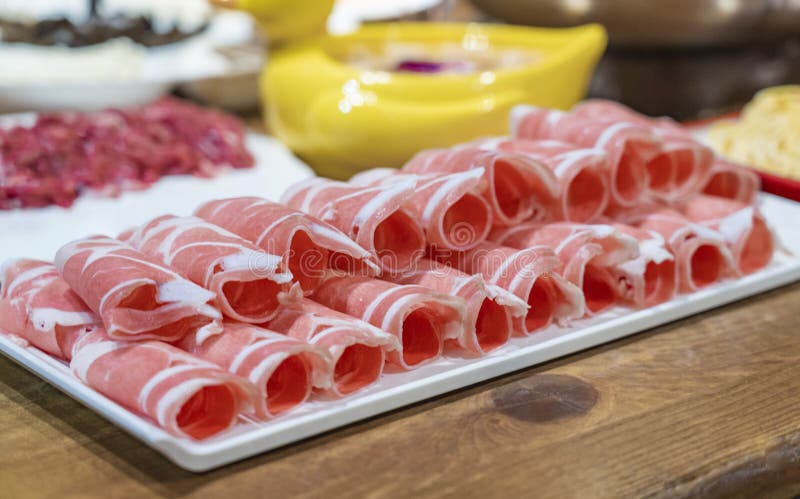 Raw Beef and Mutton Rolls on a Plate Stock Photo - Image of rolls ...