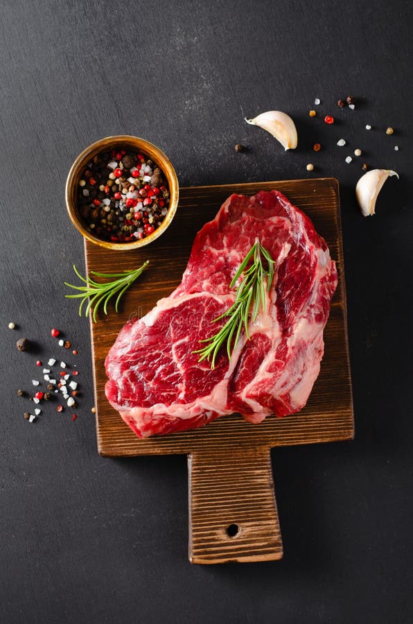 Raw Beef Organic Meat, Black Background, Beef Steak Stock Photo - Image ...