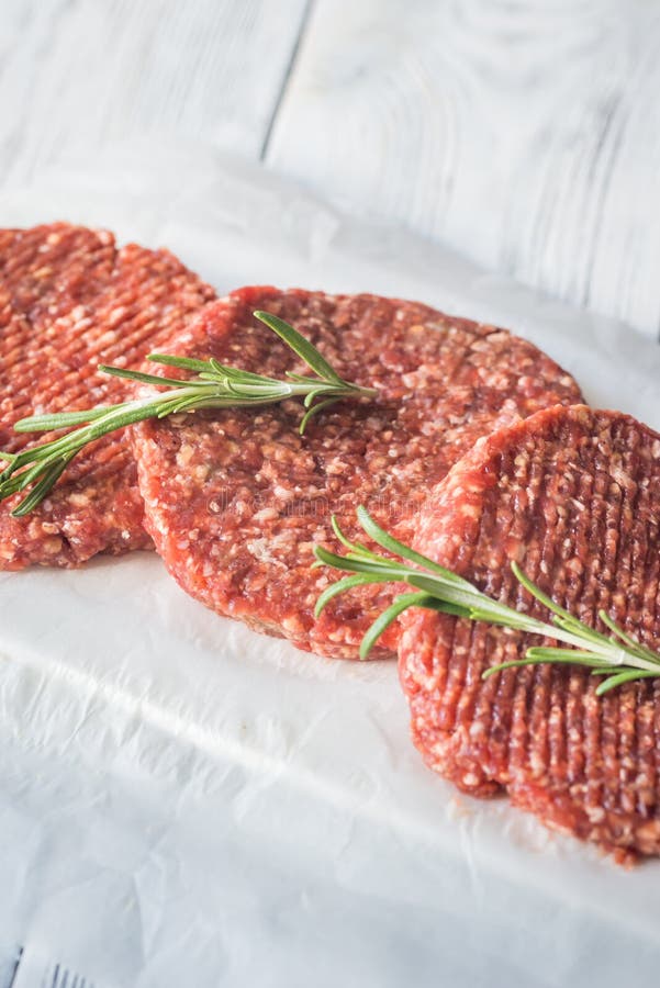 Raw beef patties stock photo. Image of delicious, portion - 127603316