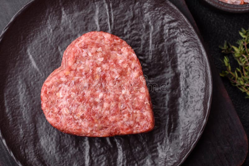 Raw Beef or Pork Burger Patty in the Shape of a Heart Stock Image ...