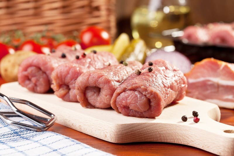 Raw Beef Rolls on a Wooden Board Stock Image - Image of gourmet, color ...