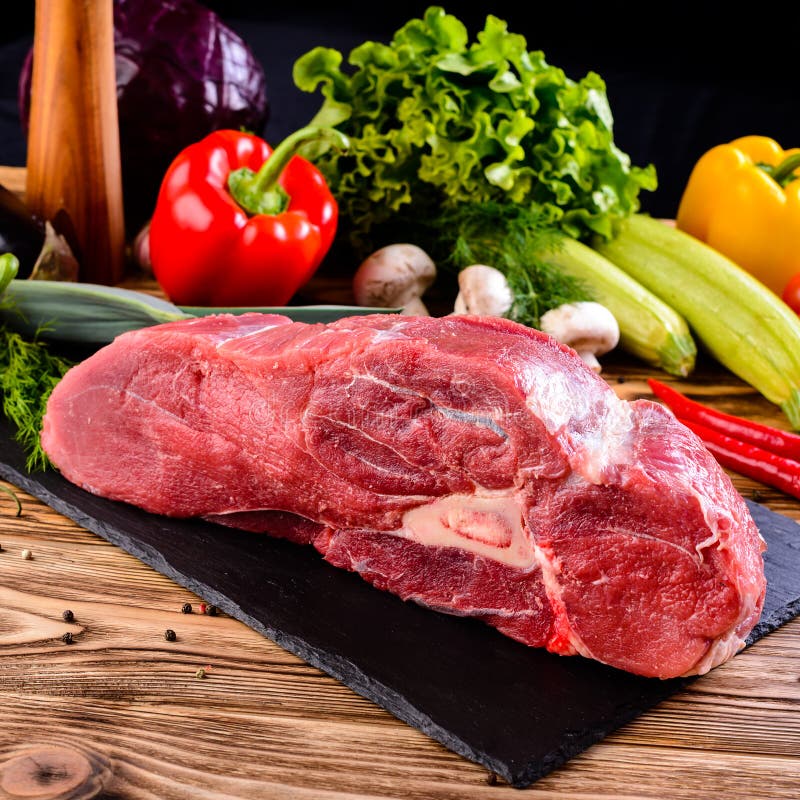 Raw Beef Shoulder Blade on the Bone Stock Photo - Image of dinner ...