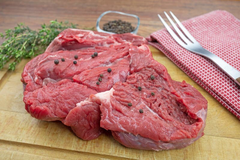 Raw Beef Side on a Cutting Board Stock Photo - Image of bass, freshness ...