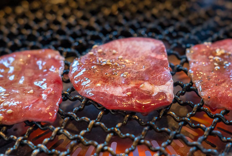 Raw Beef Slice on Grille for Barbecue or Japanese Style Yakiniku Stock ...