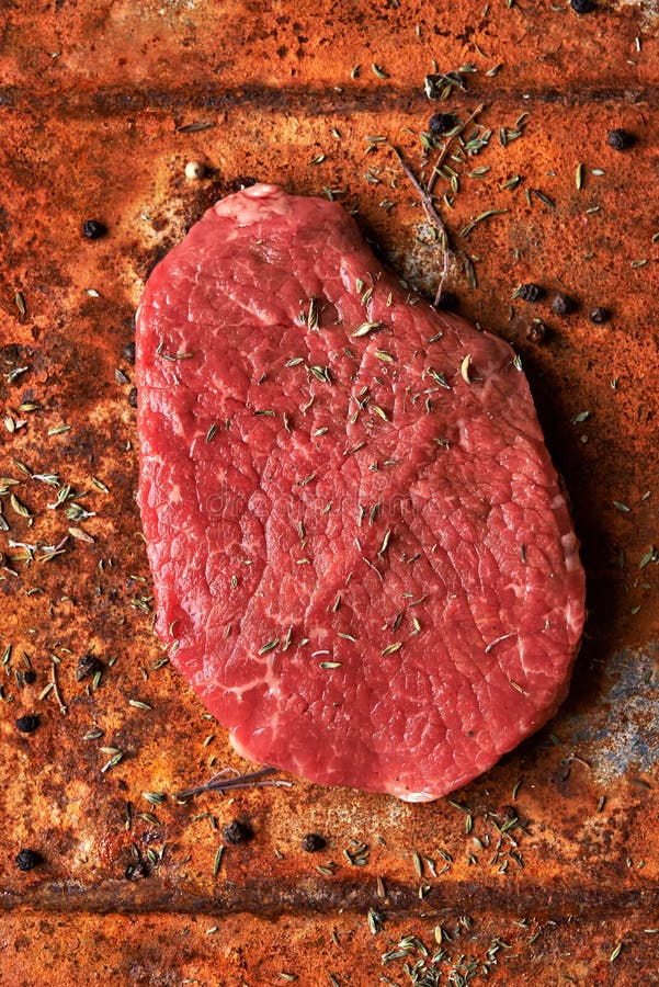 Raw Beef on Rusty Background Stock Image - Image of meat, bloody: 119719533