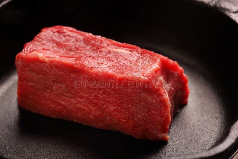 Raw Beef Steak on Cast Iron Skillet Stock Photo - Image of closeup ...