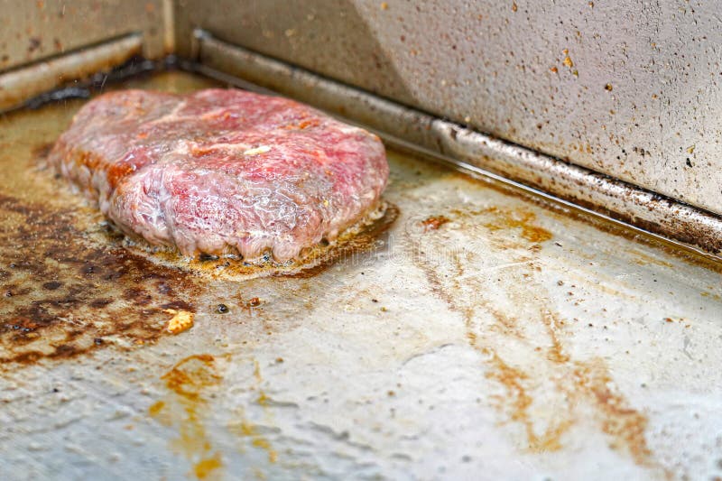 Raw Beef Steak is Fried on a Stove in a Restaurant Kitchen Stock Image ...