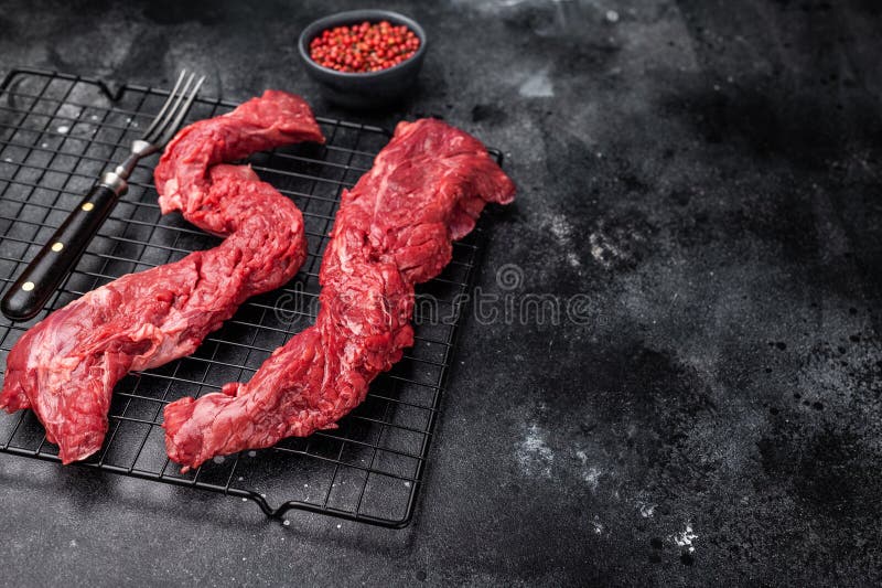 Raw Beef Steak Machete, Uncooked Meat . Black Background Stock Photo ...