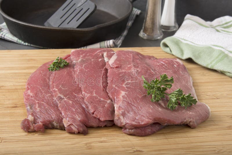 Thin sliced beef steaks stock photo. Image of board - 162148928