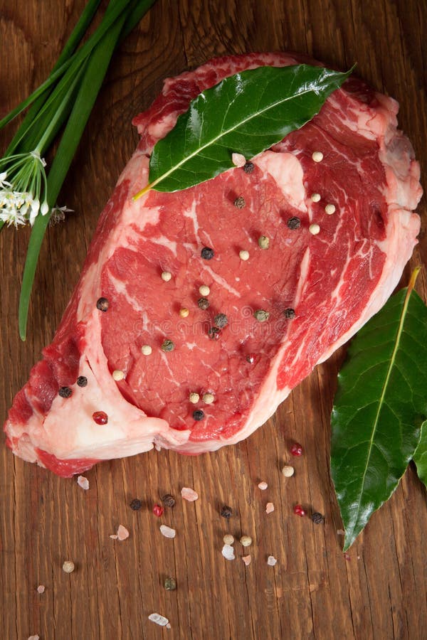 Raw Beef Steaks Seasoned With Spices Stock Photo - Image of meat, bowl ...