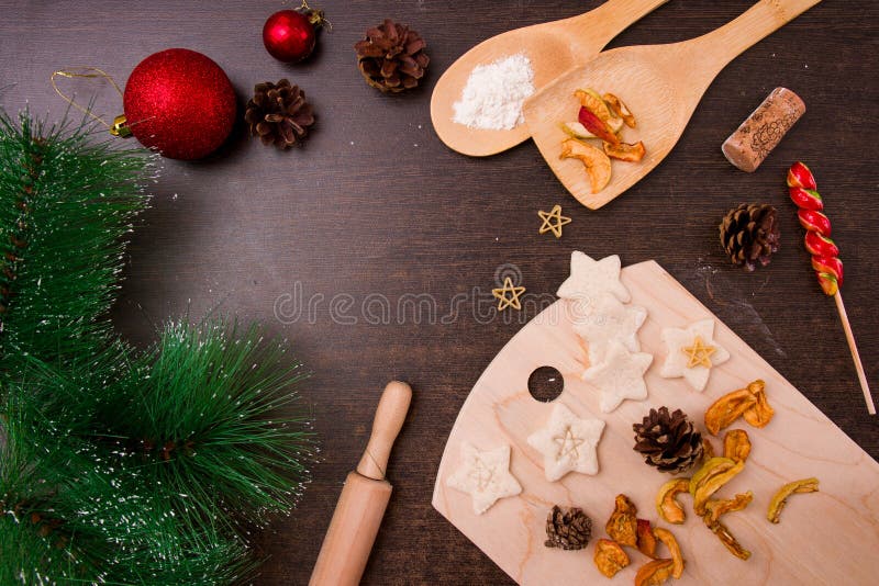 Raw Biscuits in the Shape of Stitches on a Cutting Board Stock Photo ...