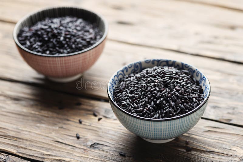 Raw black asian rice stock photo. Image of grain, eating - 161887996